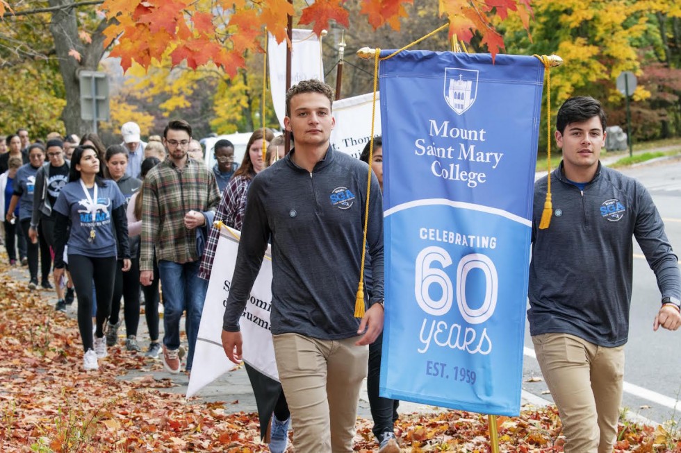 Mount community celebrates its 60th by walking in the footsteps of the ...