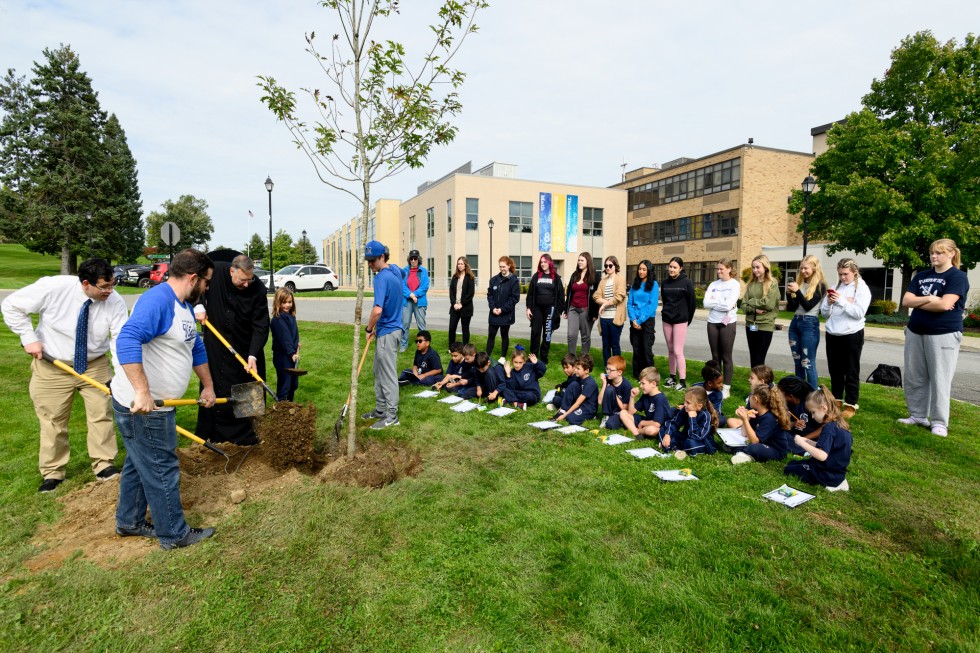 Mount freshmen, Bishop Dunn students plant tree on campus | Mount Saint ...